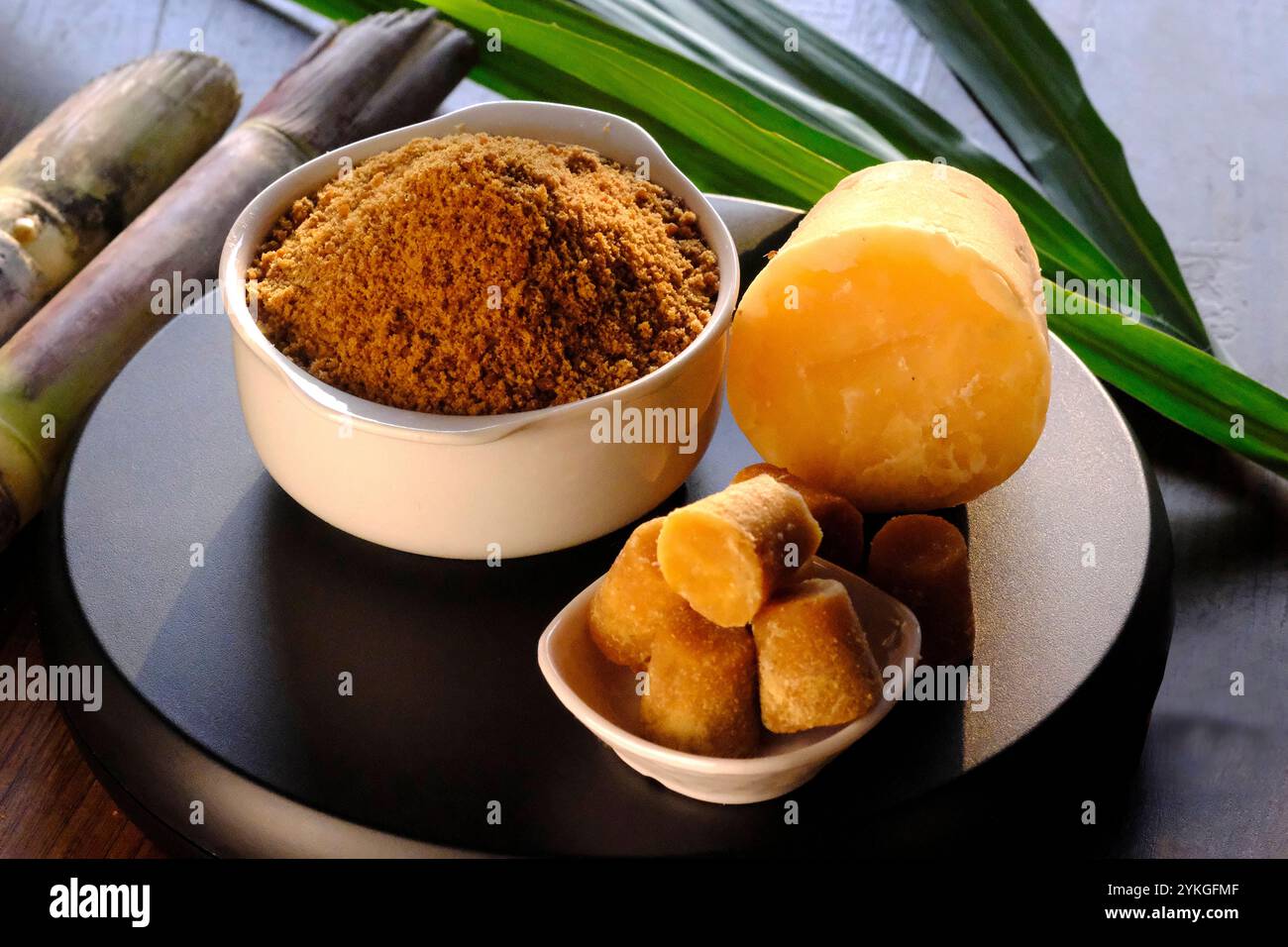 Jaggery powder with jaggery cubes. Jaggery is used as an ingredient in ...