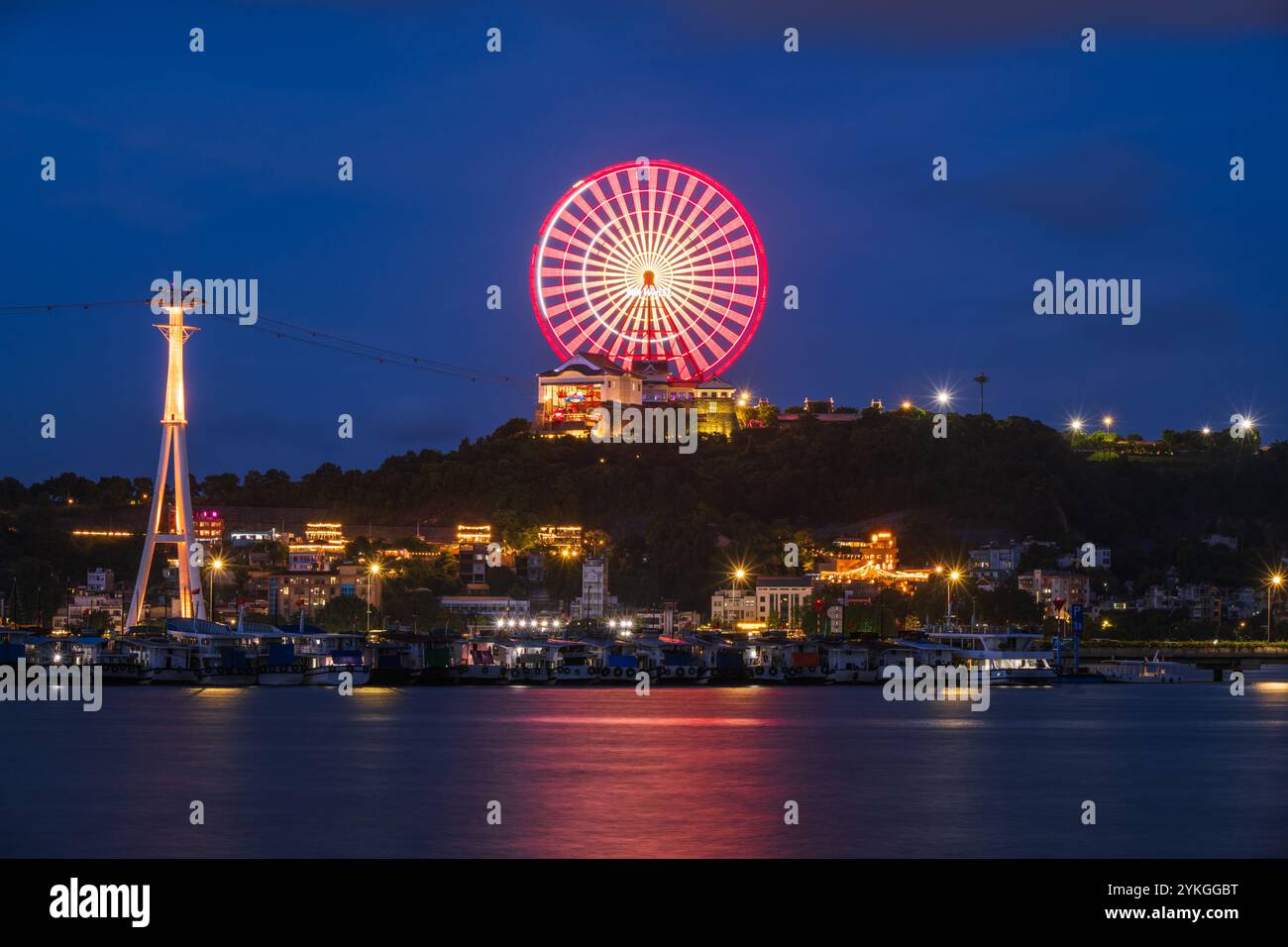 This is a night view of the famous Sun Wheel, a popular attraction in ...