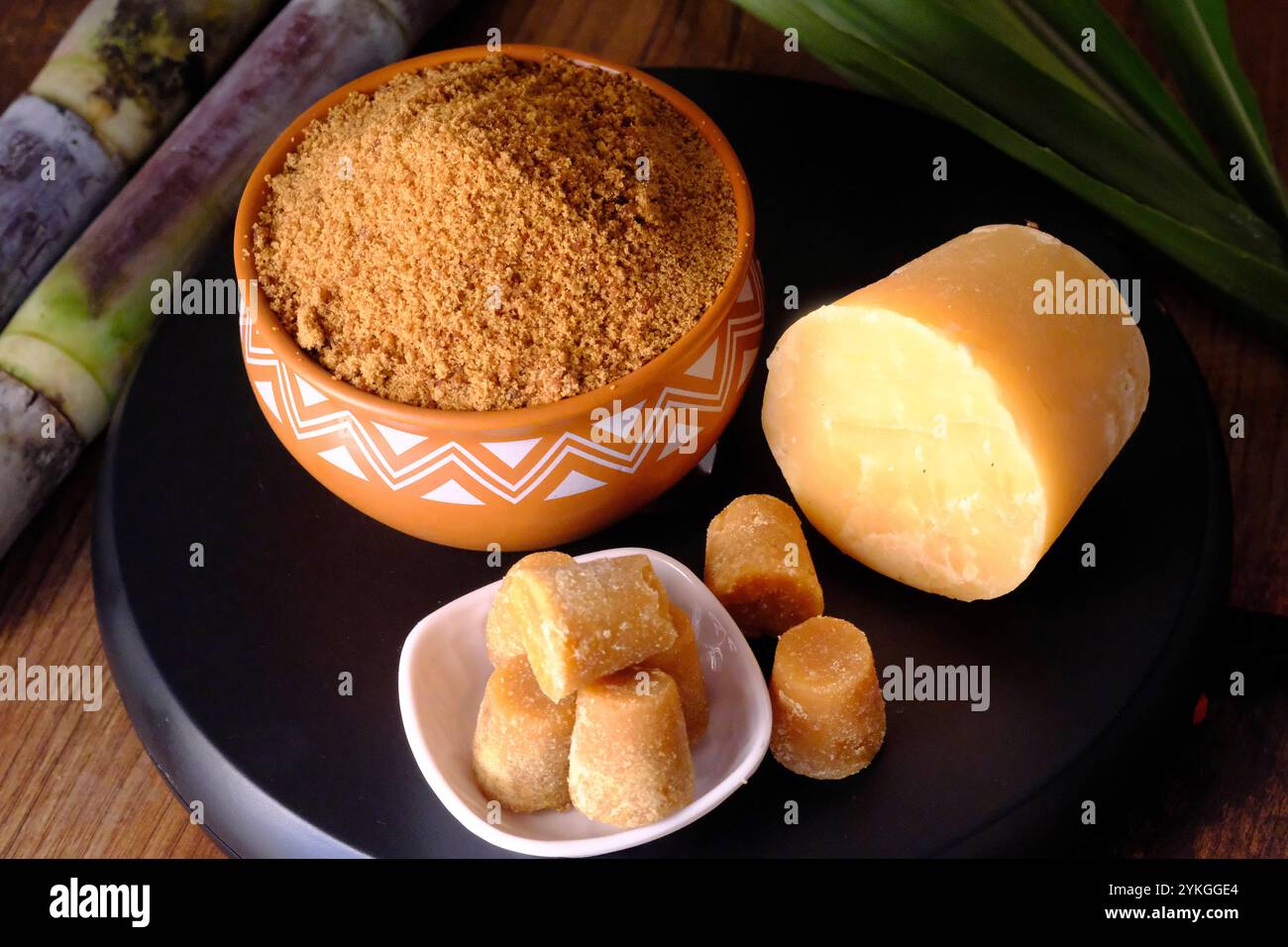 Jaggery powder with jaggery cubes. Jaggery is used as an ingredient in ...