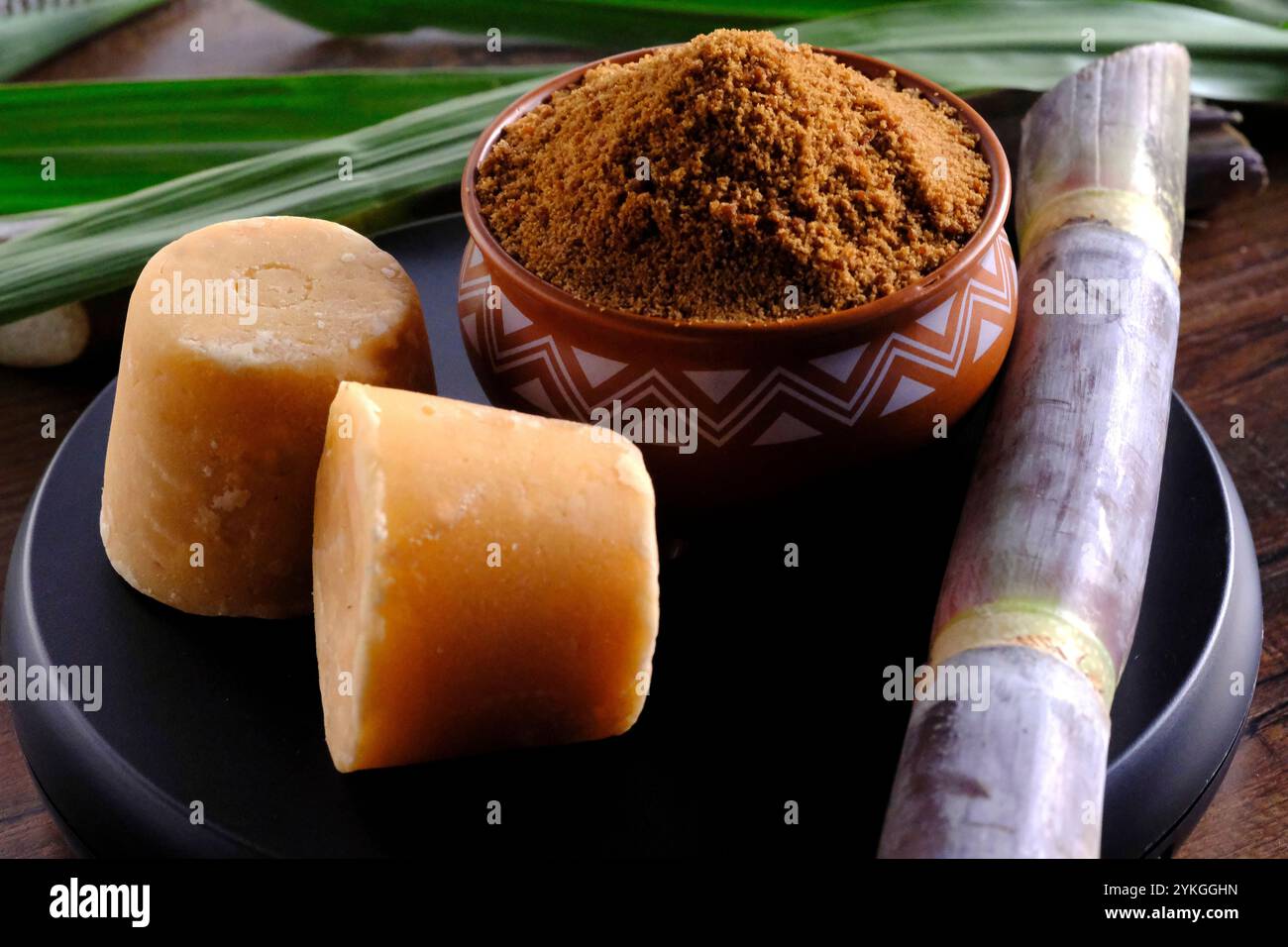 Jaggery powder with jaggery cubes. Jaggery is used as an ingredient in ...