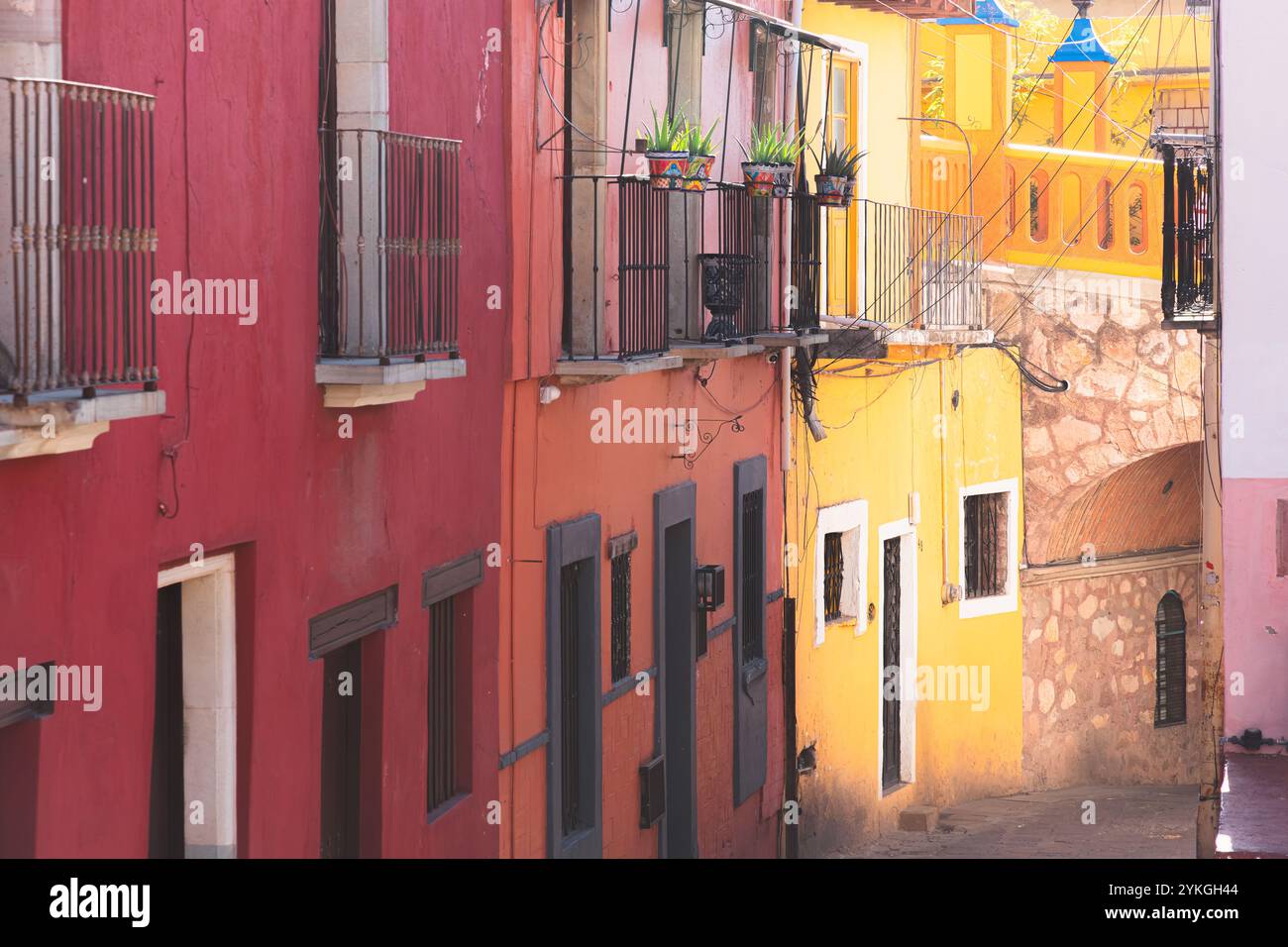 Vibrant alley in Guanajuato's old town with colorful Spanish colonial ...