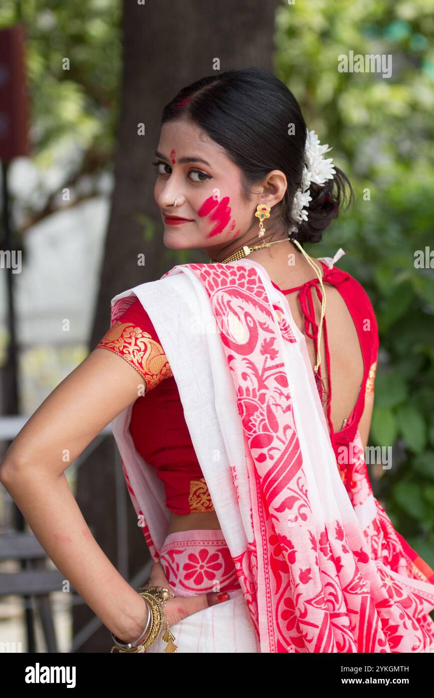 During Sindur Khela, Bengali women dressed in a beautiful traditional saris and jewellery after ...