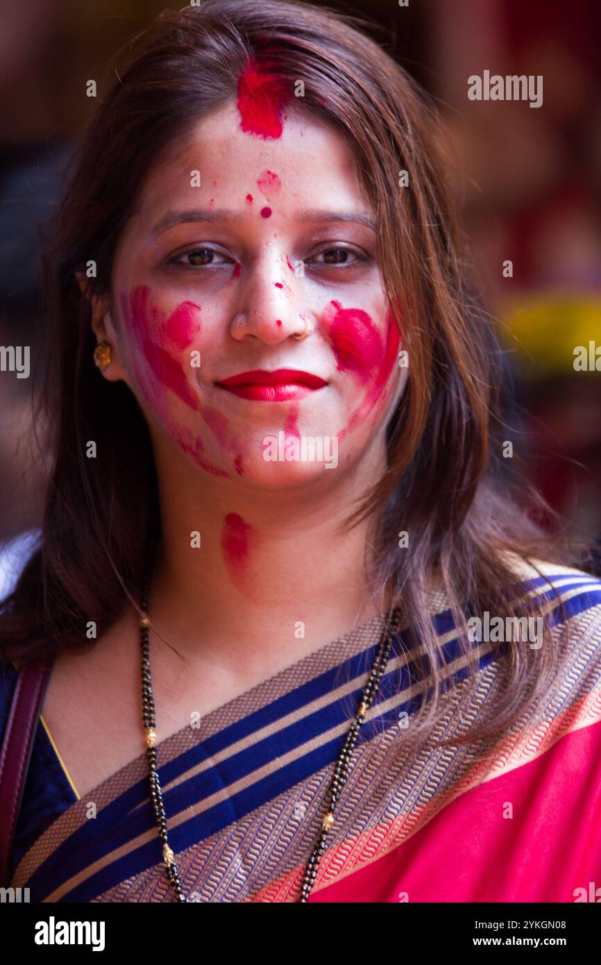 During Sindur Khela, Bengali women dressed in a beautiful traditional saris and jewellery after ...