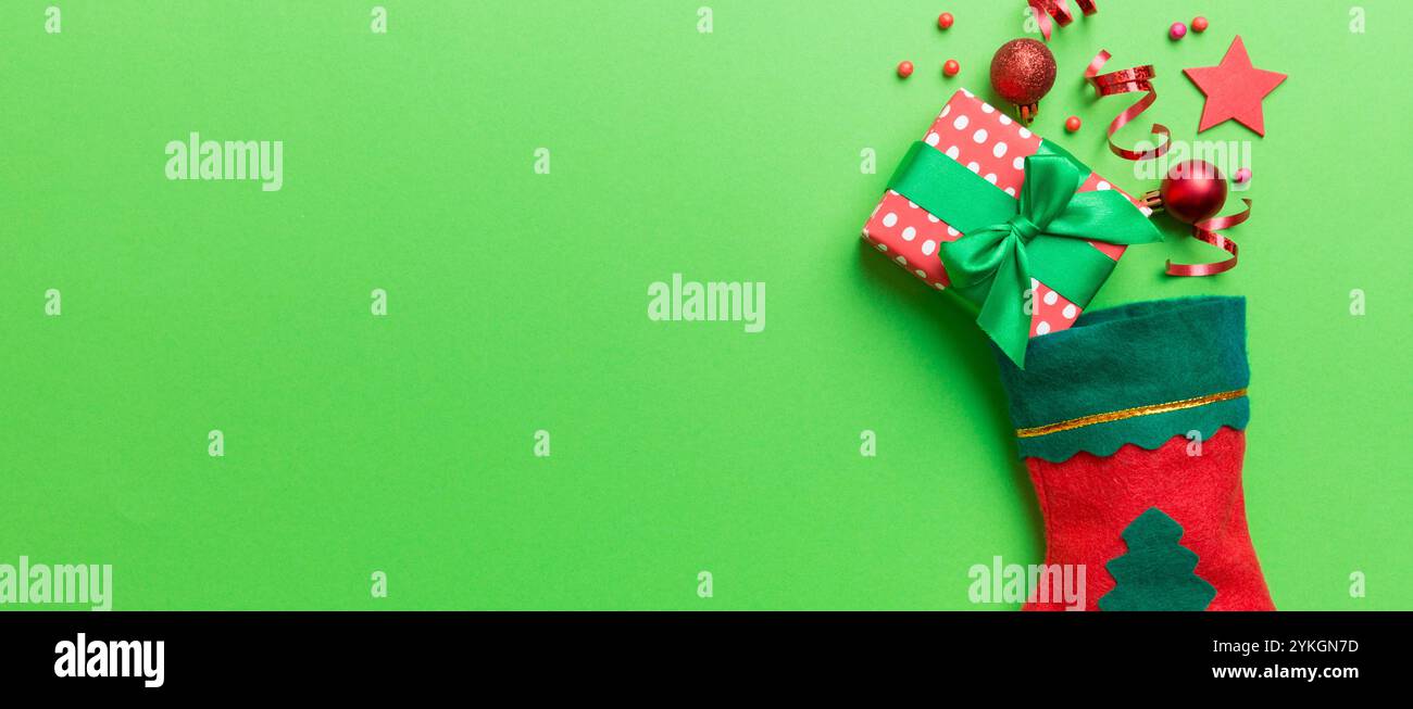 santa red sock top view on the color background with empty space ...