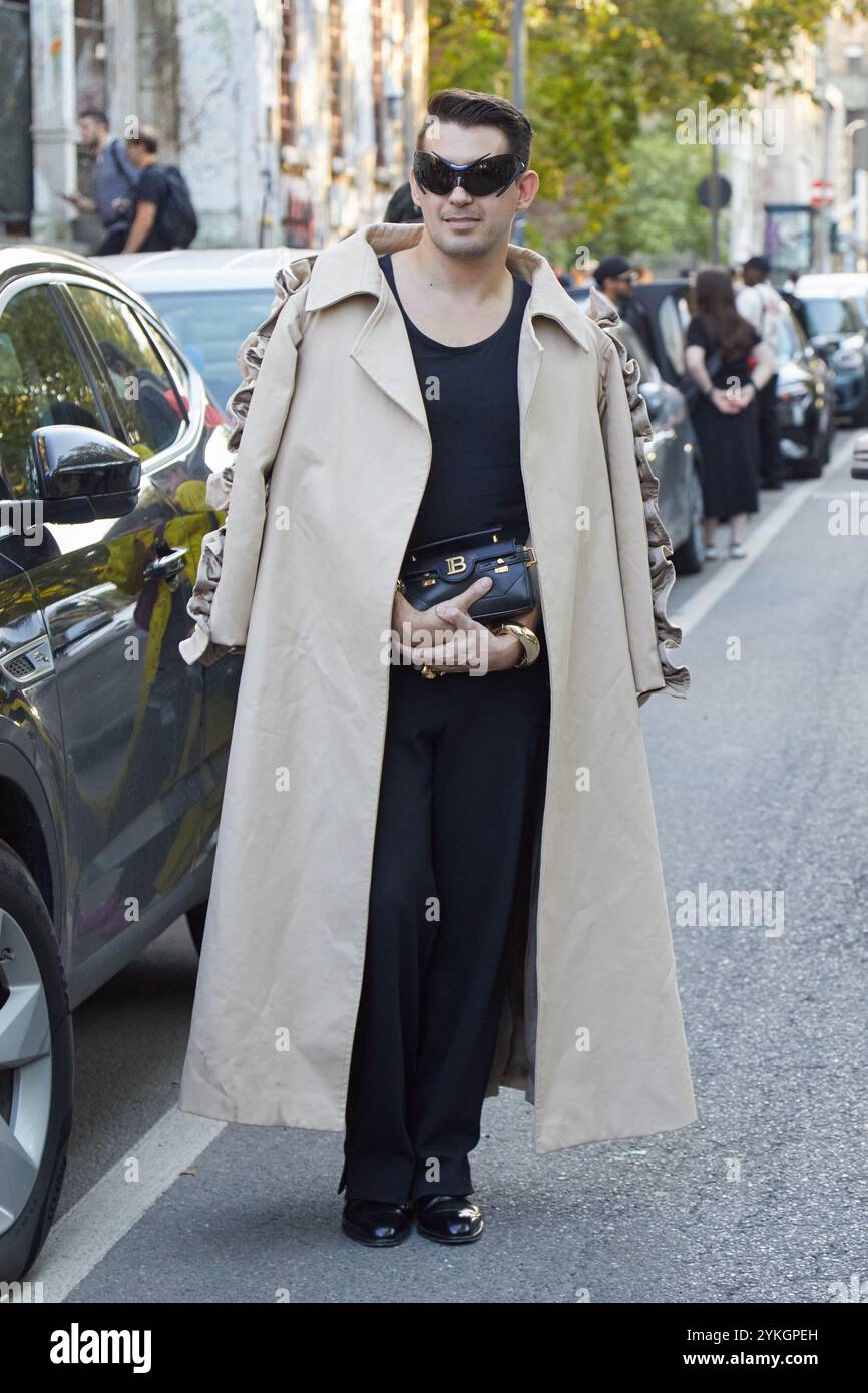 MILAN, ITALY - SEPTEMBER 21, 2024: Hanan Besovic with beige coat before ...