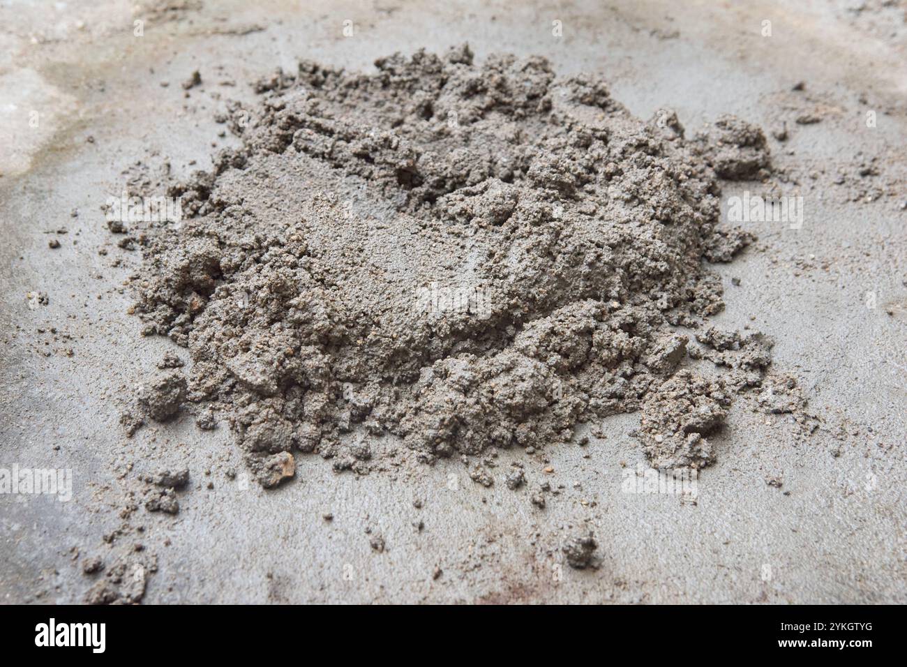 pile of mortar or cement mixture, rough, granular texture of cement and ...