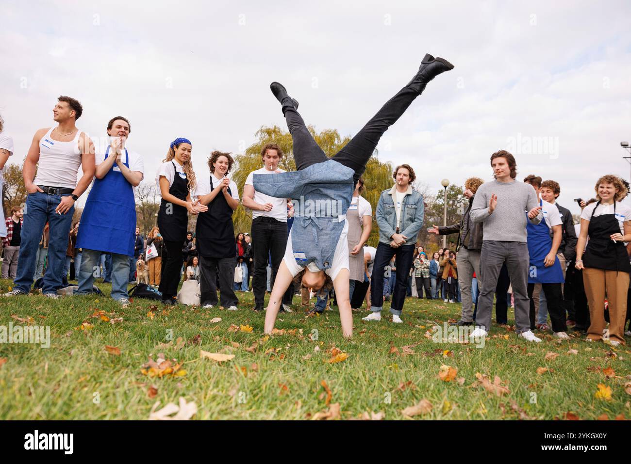 A contestant cartwheels during a Jeremy Allen White look a like at ...
