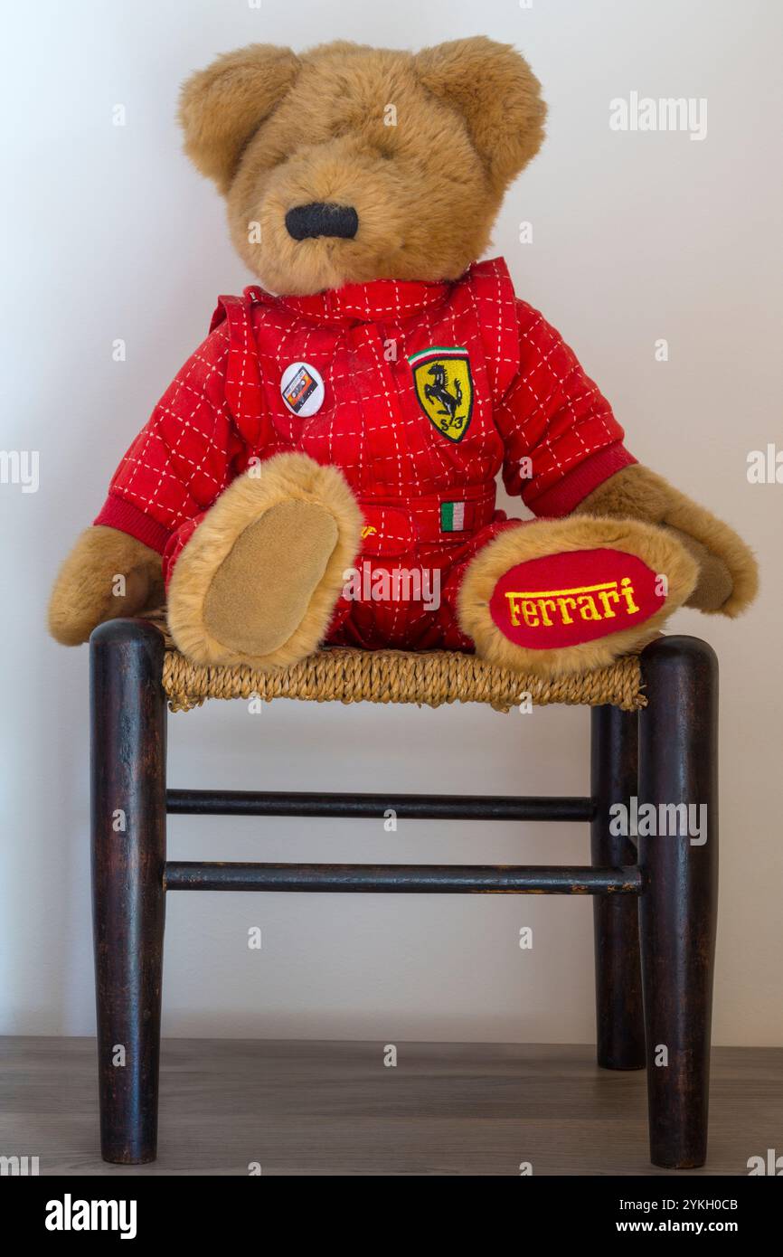 Ferrari Teddy Bear soft cuddly toy sitting on stool Stock Photo - Alamy