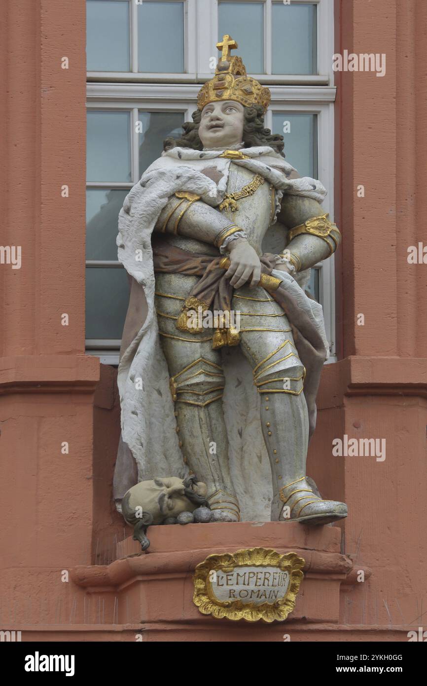 Sculpture of a Roman emperor with golden crown and cross, golden, view ...