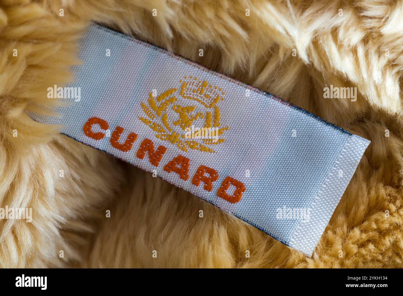 Cunard label with logo on Cunard teddy bear soft cuddly toy Stock Photo ...