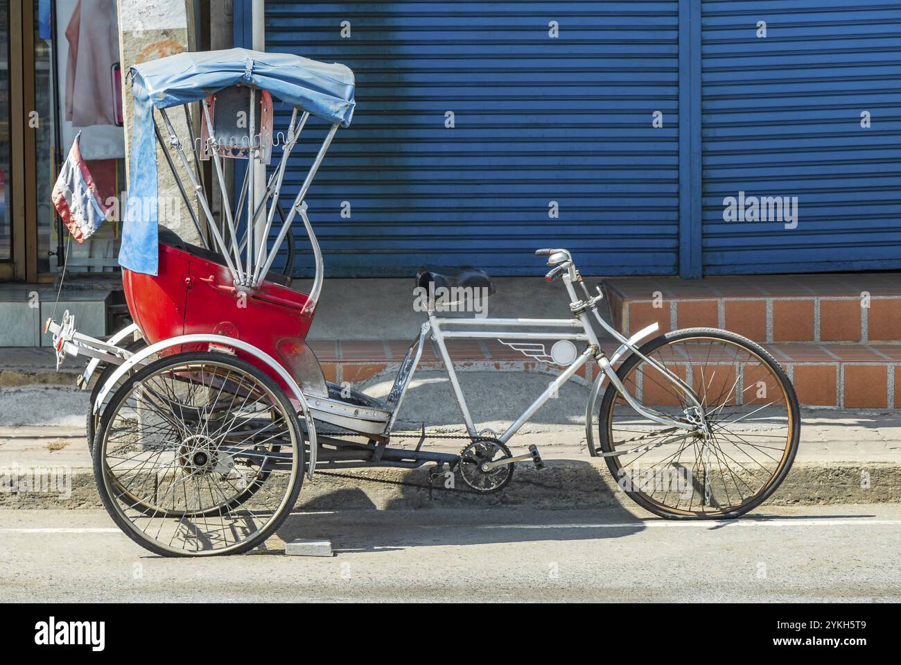 Old red bike rickshaw rikshaw trishaw in Don Mueang Bangkok Thailand ...