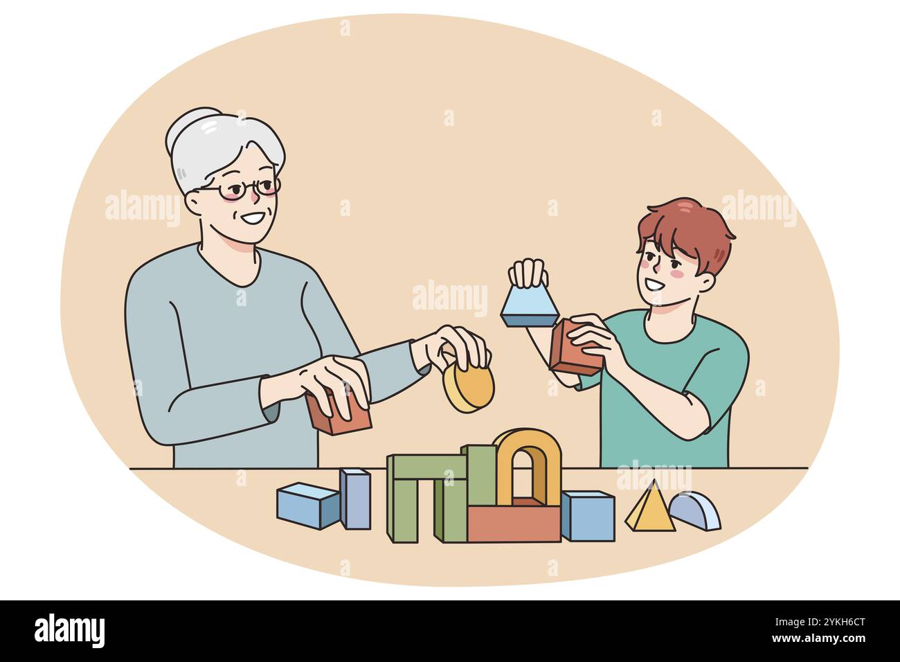 Loving elderly grey-haired grandmother play toys with small grandchild ...