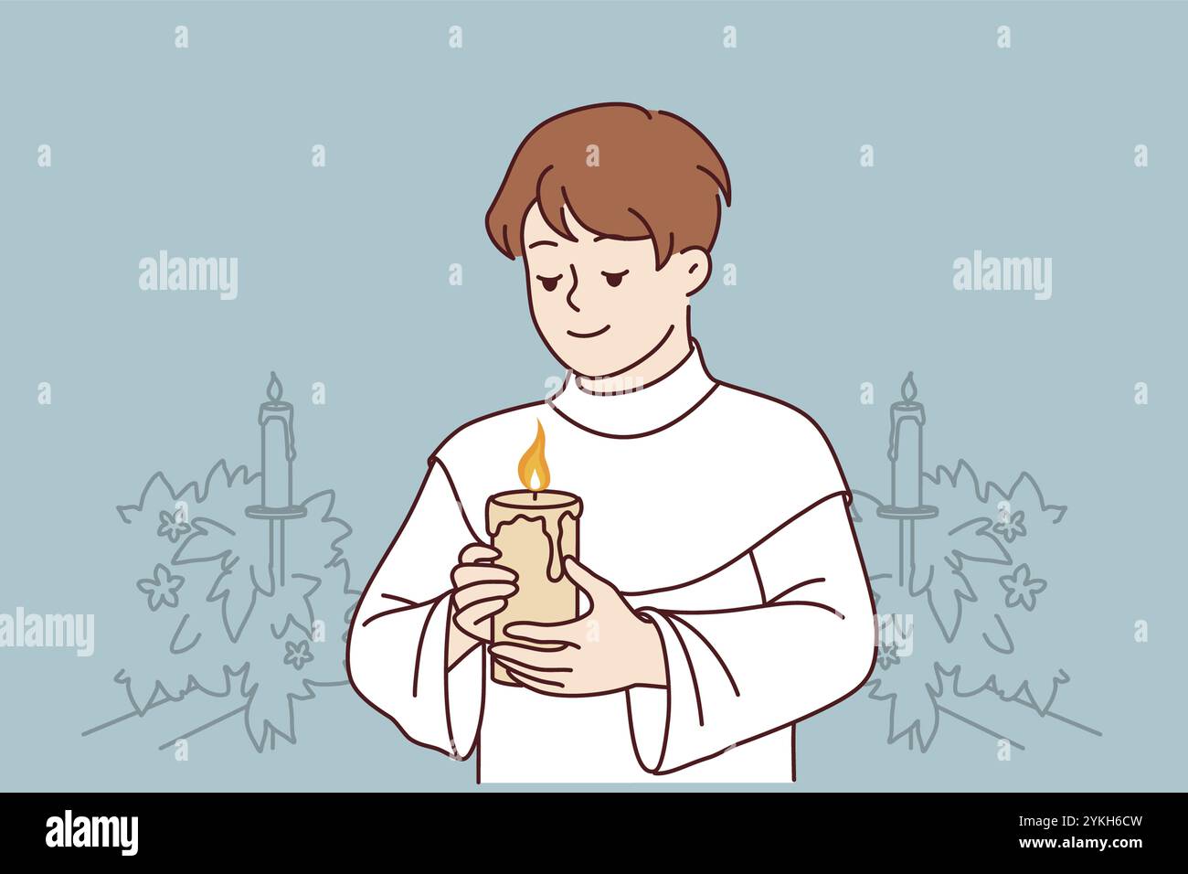 Boy participates in holy communion and holds burning candle for ...