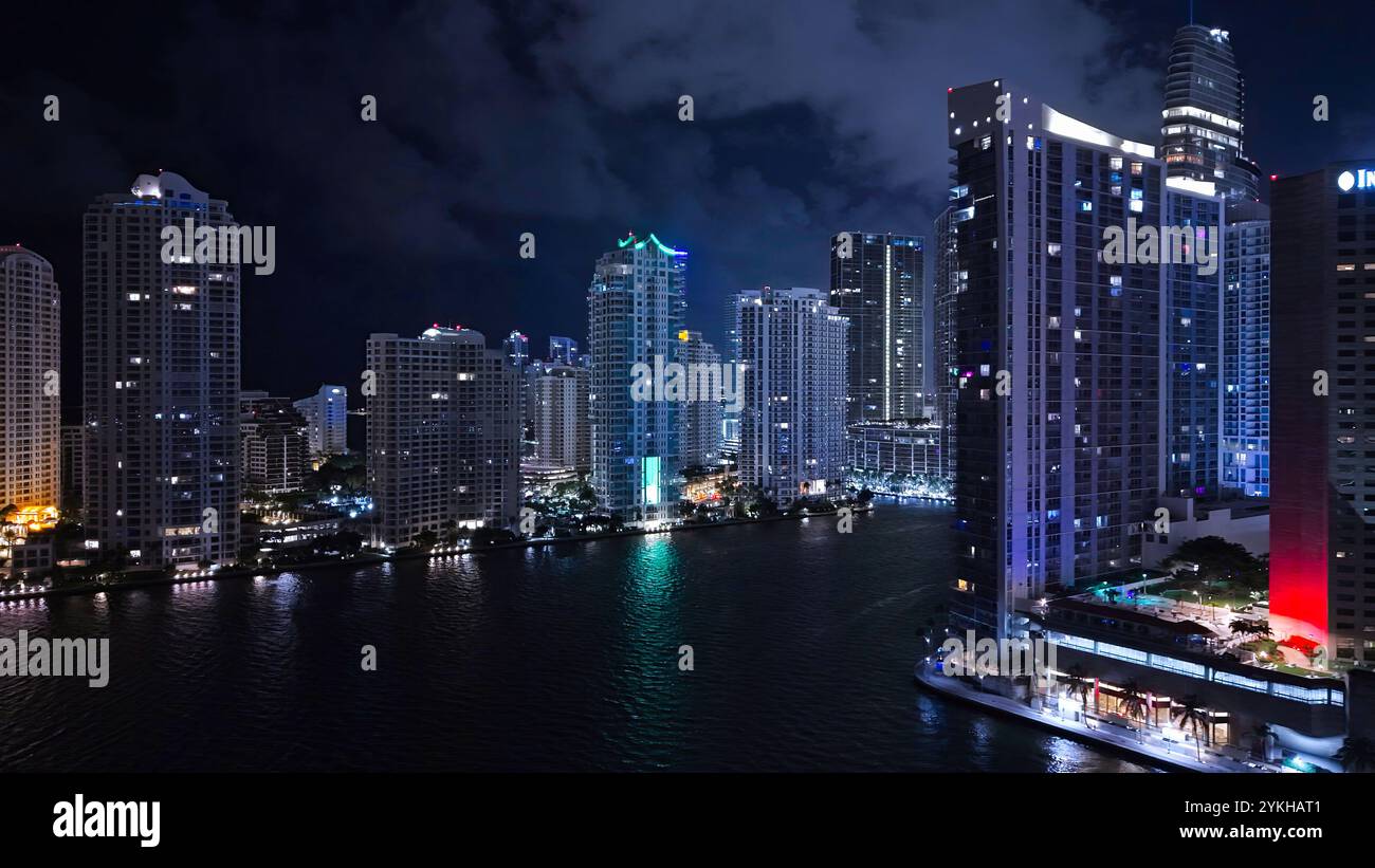 Miami River by night at Downtown with iconic skyscrapers aerial view ...