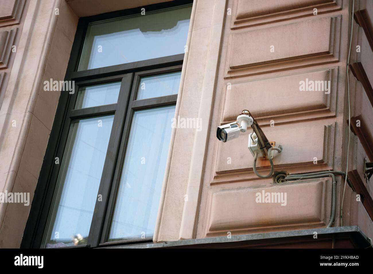 A Surveillance Camera Has Been Installed and Mounted Outside a Building ...
