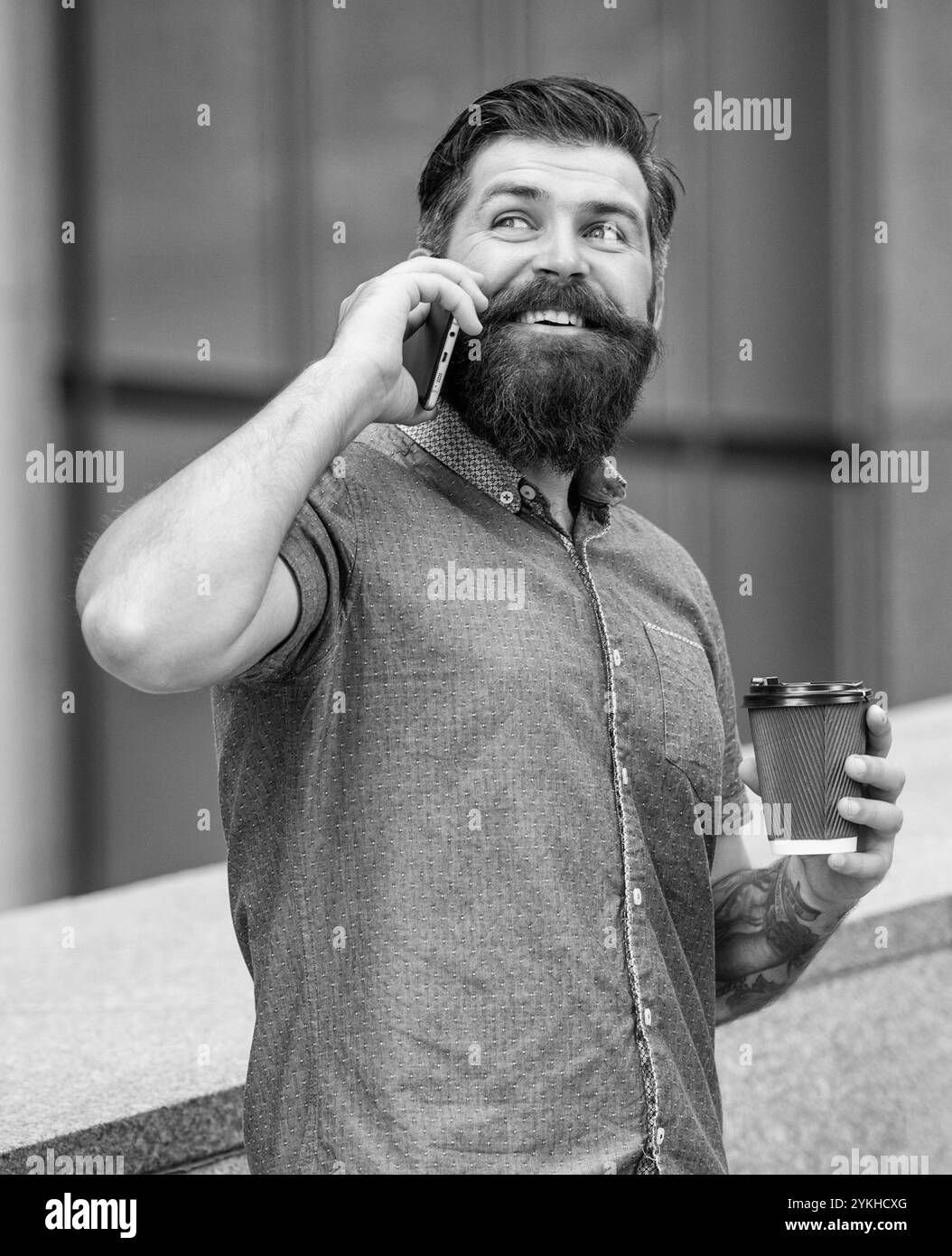 Glad man smartphone call Black and White Stock Photos & Images - Alamy