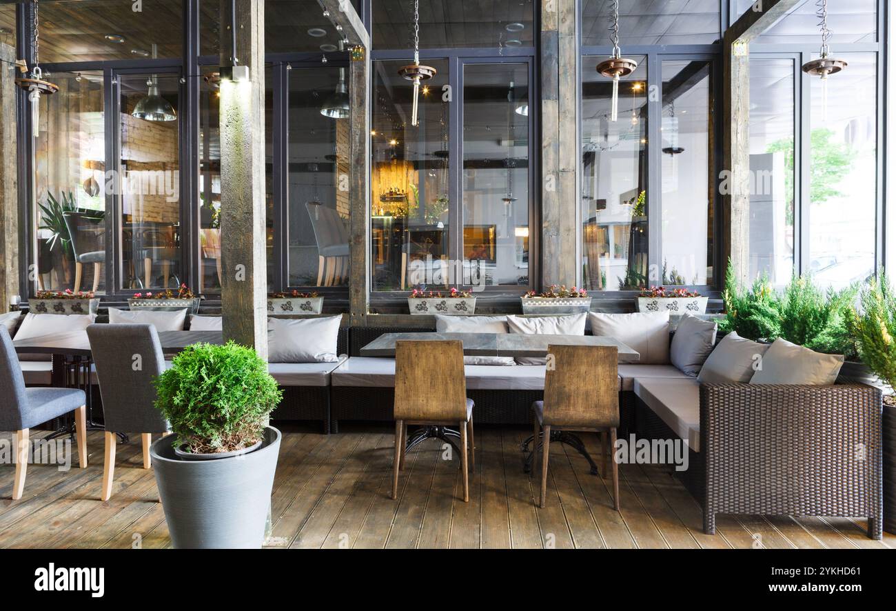 Interior of cozy restaurant, loft style Stock Photo - Alamy