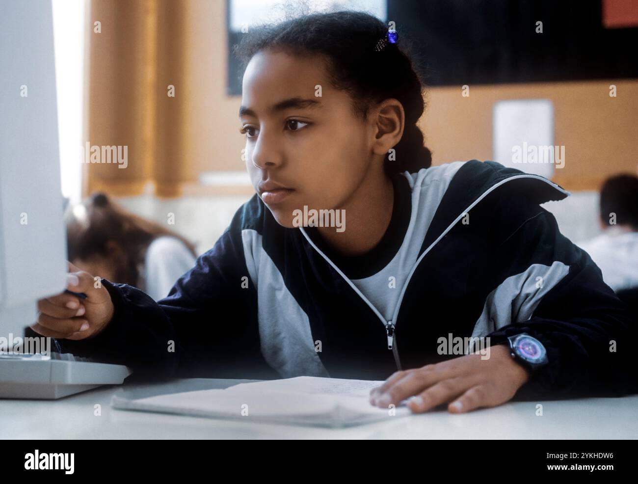 COMPUTER CLASSES Junior black African American girl in school uniform ...