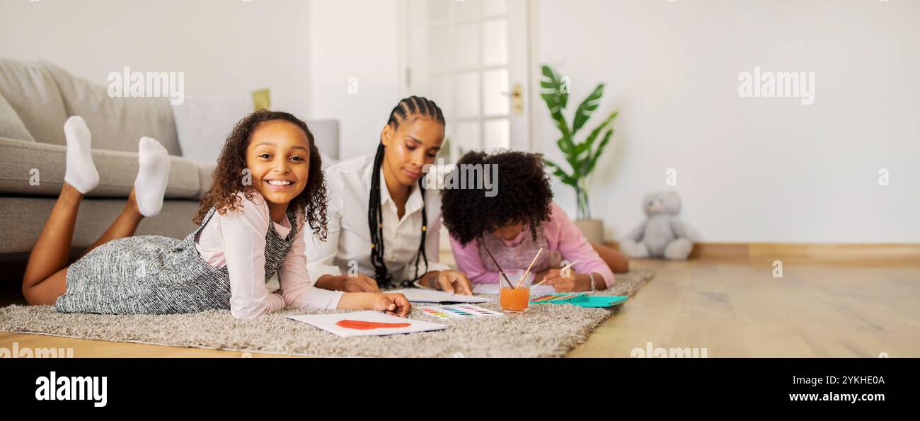 Happy children engaging in art activities at home on a cozy afternoon ...