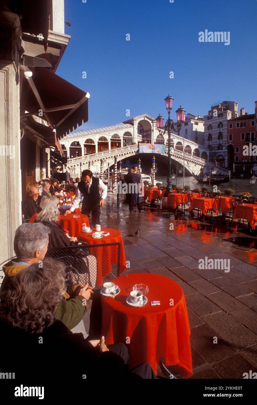 Rialto bridge venice cafe tables customers coffee view hi-res stock ...