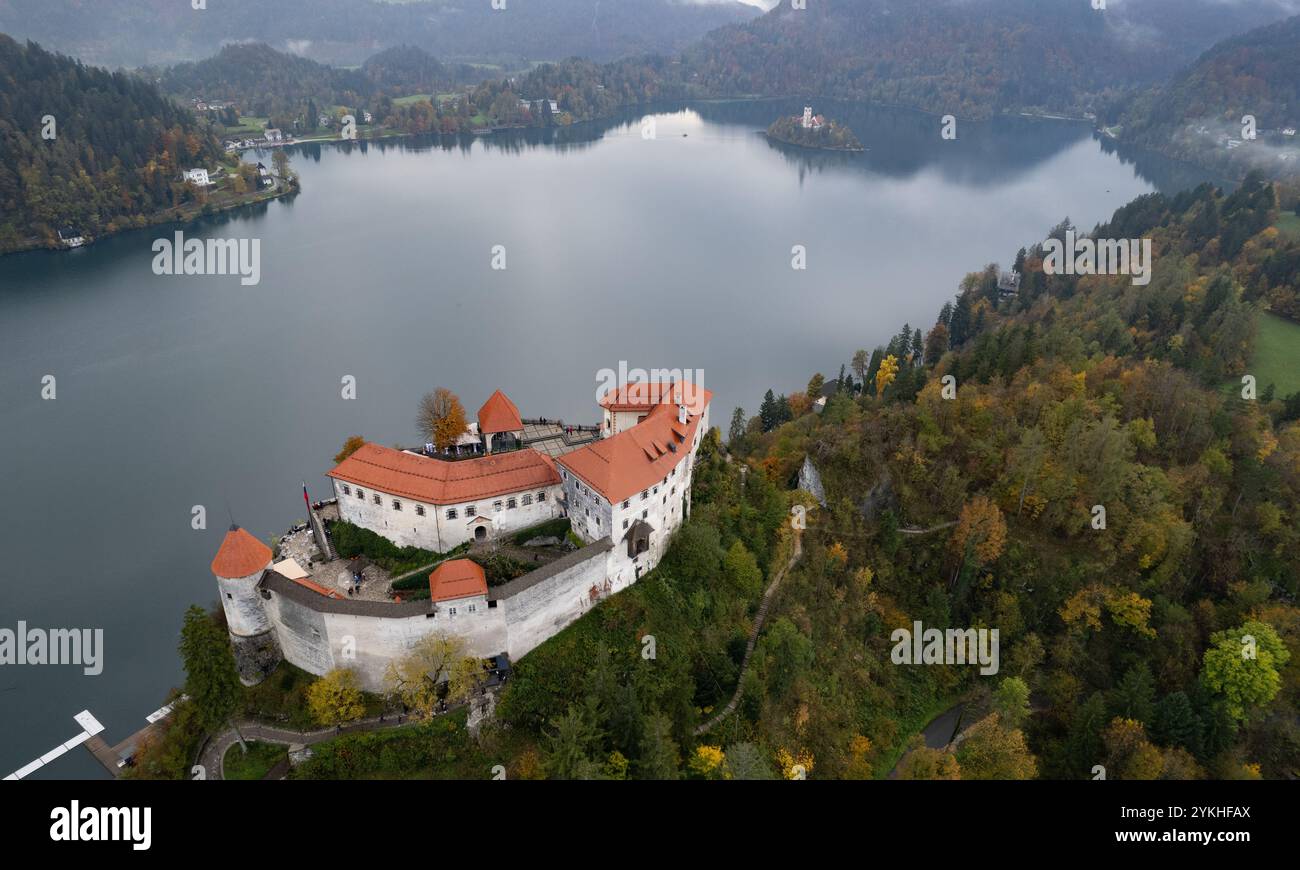 Aerial Drone scenery of the medieval bled castle, perched on a cliff ...