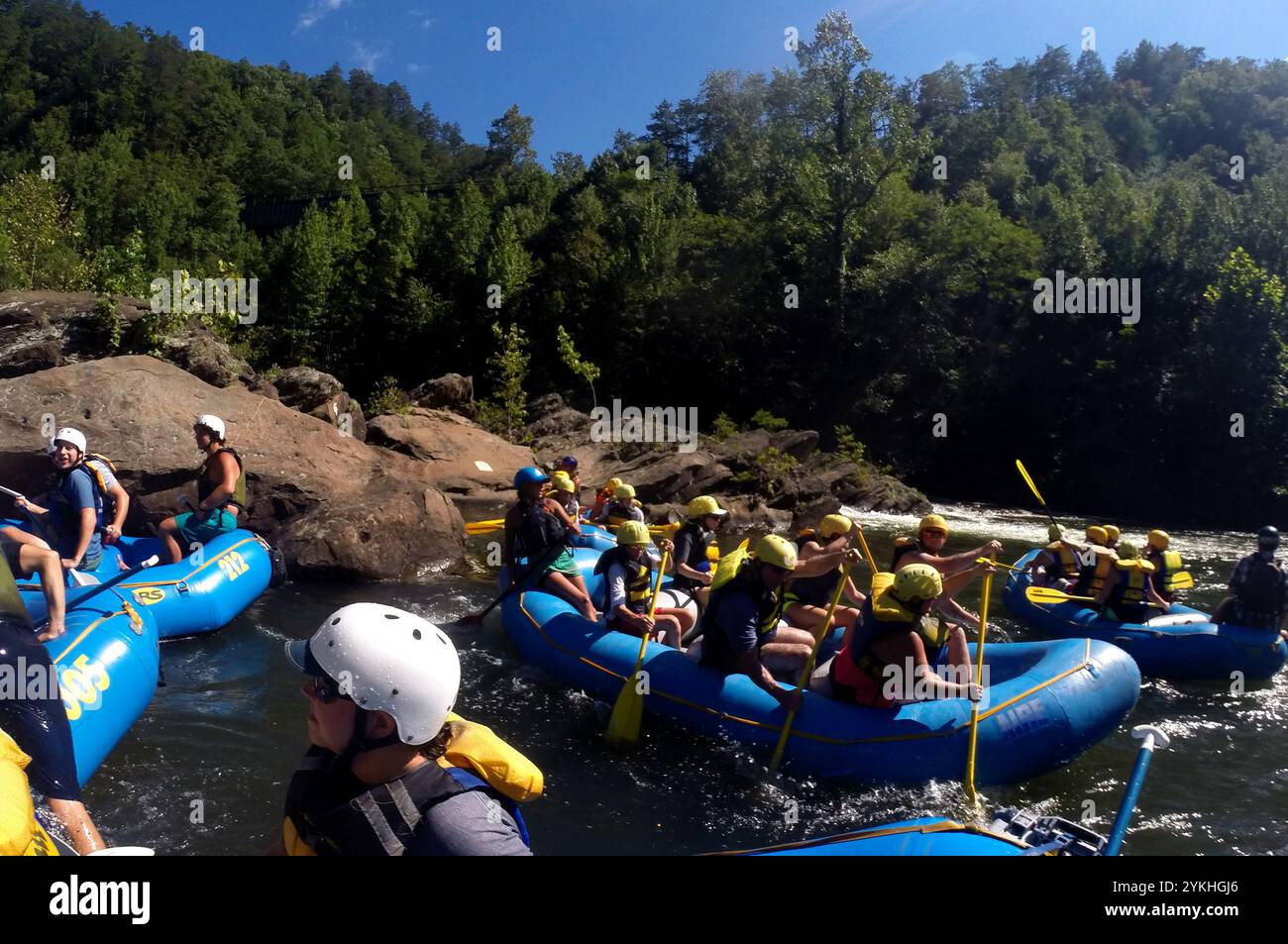 Patrons hit the rapids while whitewater rafting through the Ocoee River ...