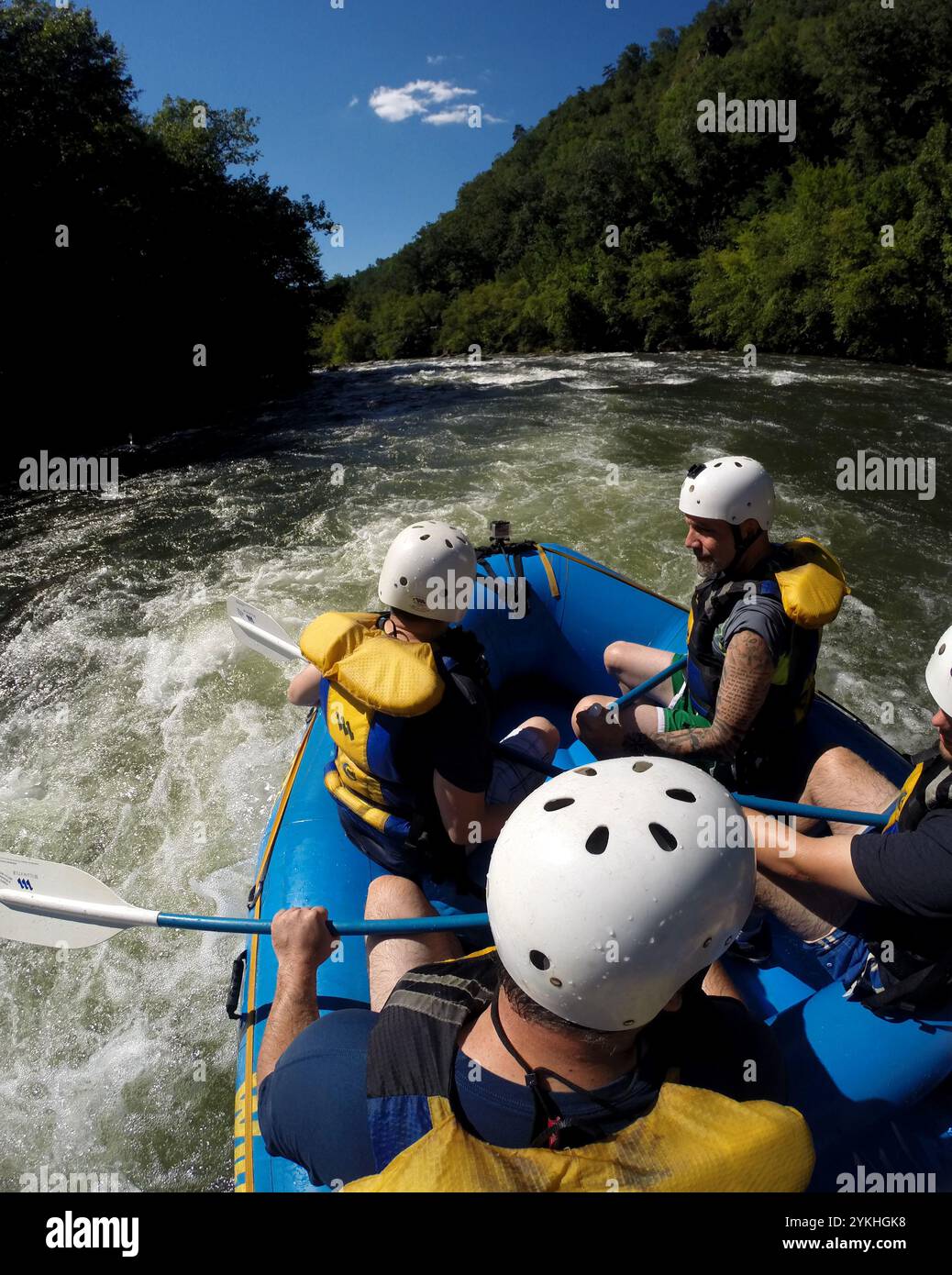 Patrons hit the rapids while whitewater rafting through the Ocoee River ...