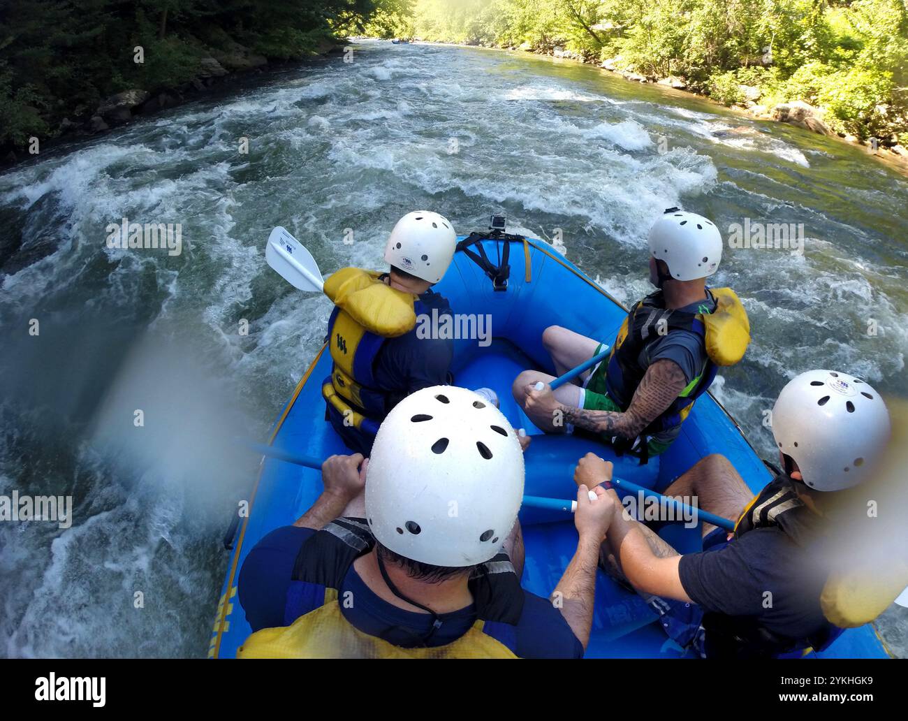 Patrons hit the rapids while whitewater rafting through the Ocoee River ...