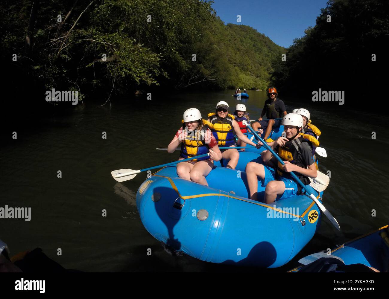 Patrons hit the rapids while whitewater rafting through the Ocoee River ...