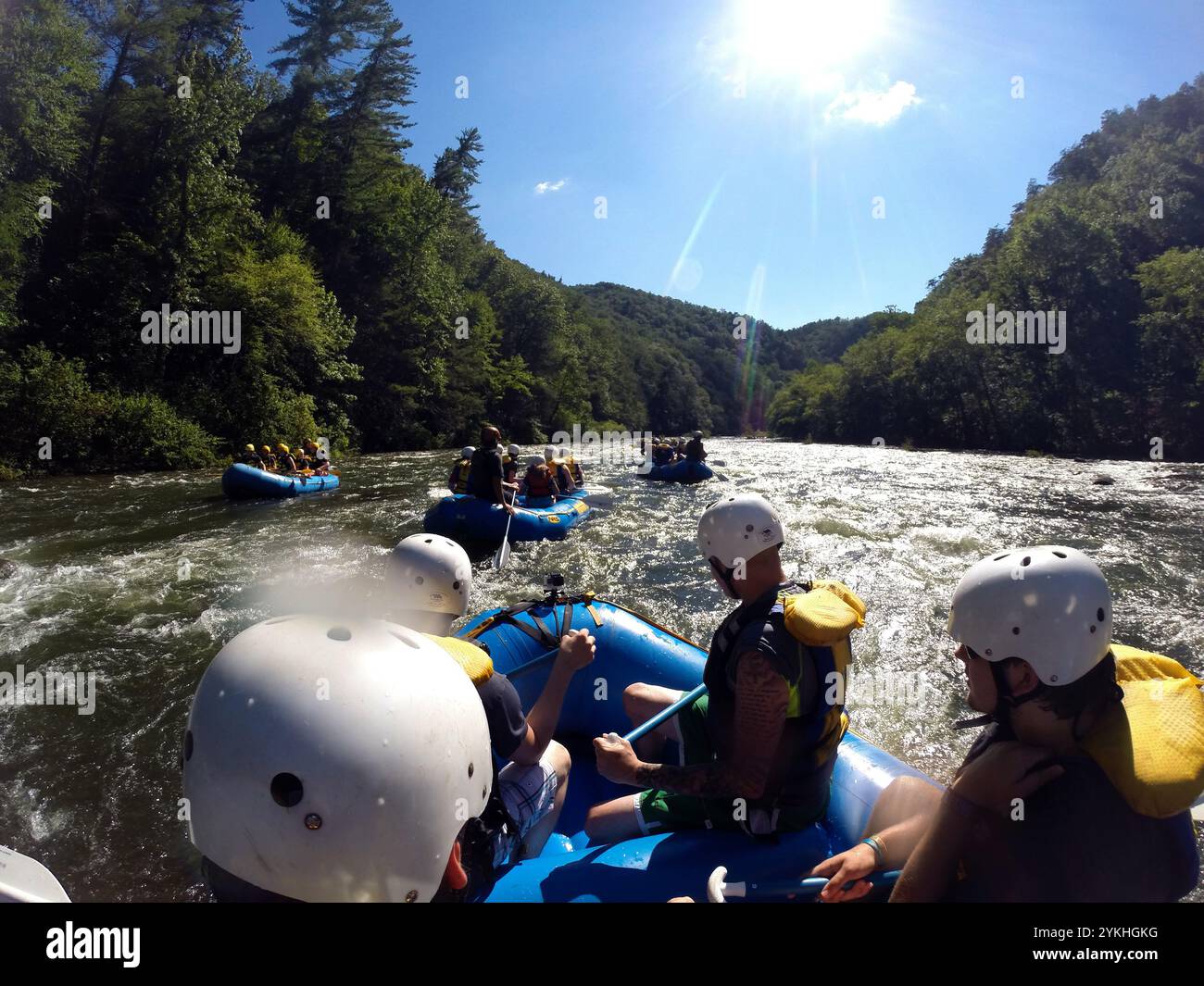 Patrons hit the rapids while whitewater rafting through the Ocoee River ...