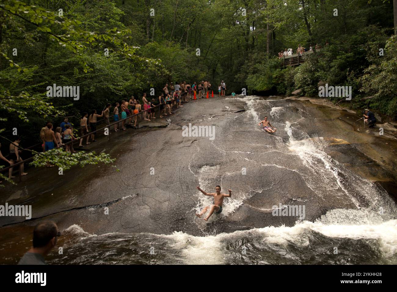 Carter Greene (left) and Michael Greene slide down the Sliding Rock in ...