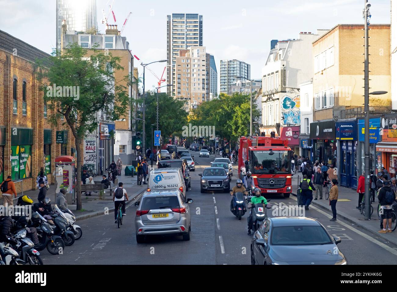 View of traffic cars people on Walworth Road looking east towards ...