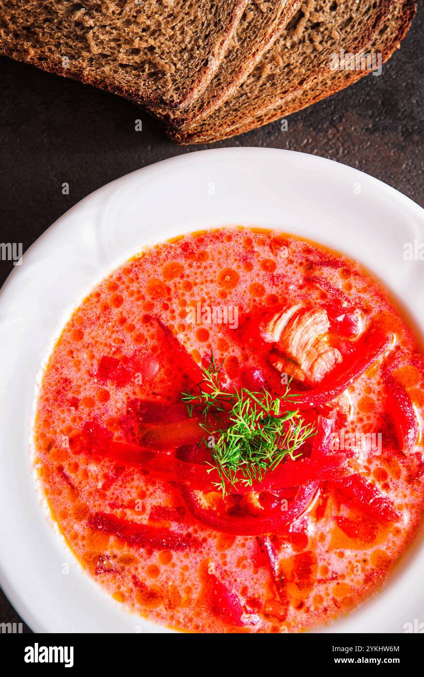 Homemade red beetroot soup on black stone slate background. Traditional ...