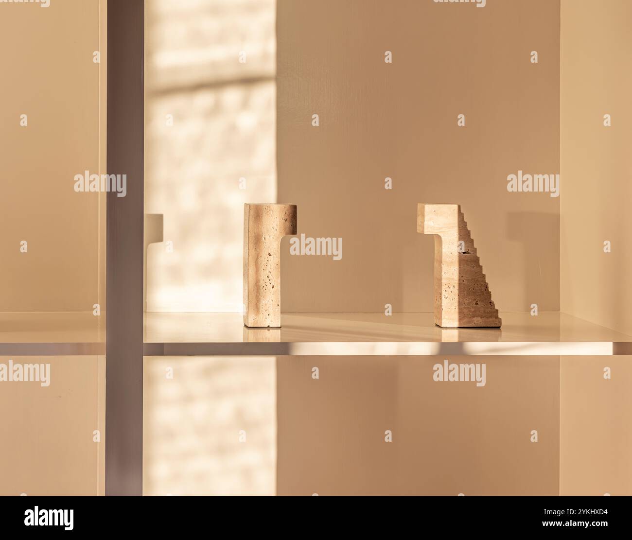 two abstract mable shapes on a shelf Stock Photo - Alamy