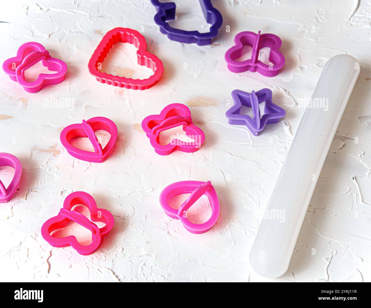 Modelling clay with cut our forms on a white isolated background for ...