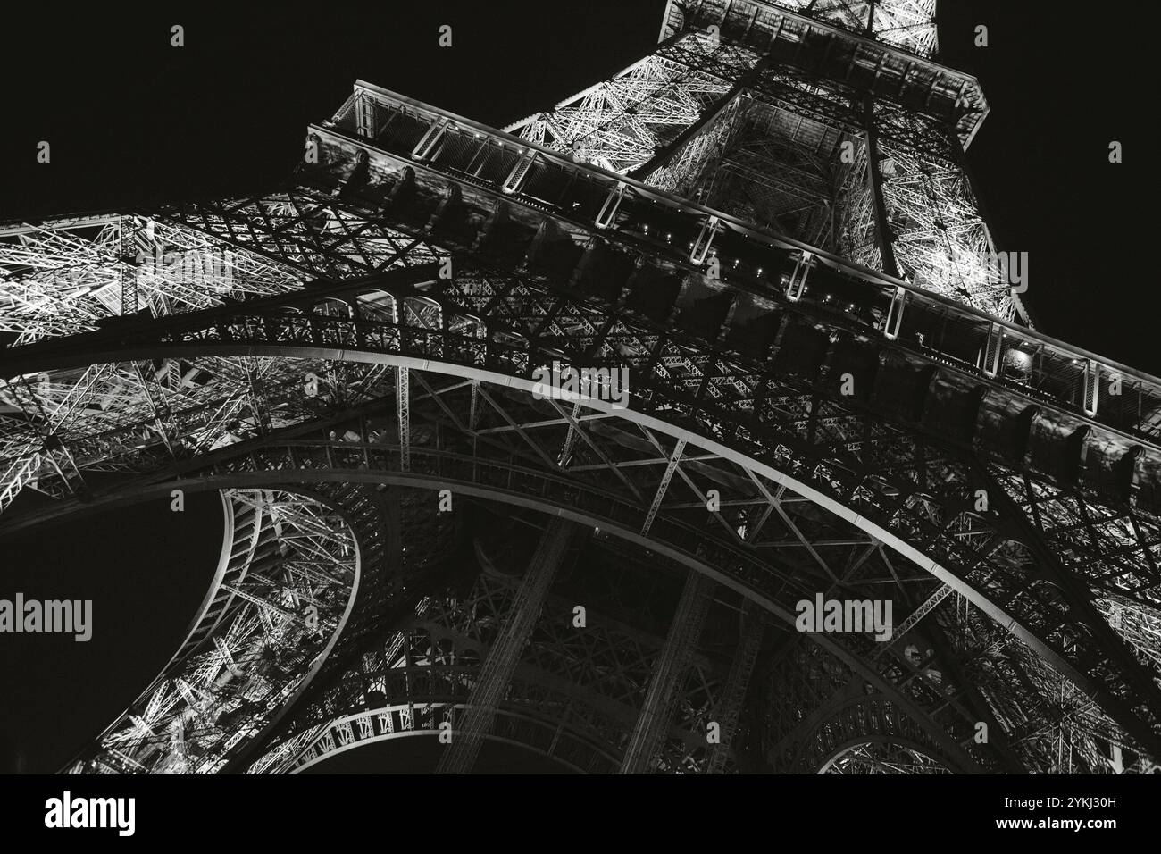 Eiffel Tower in black and white at night from a low angle Stock Photo ...