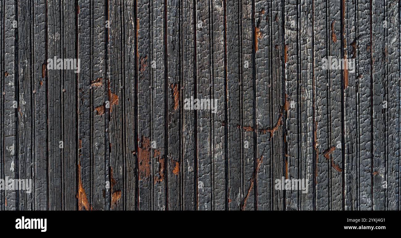 Burnt vertical wood planks texture on a bright sunny day. Background of ...