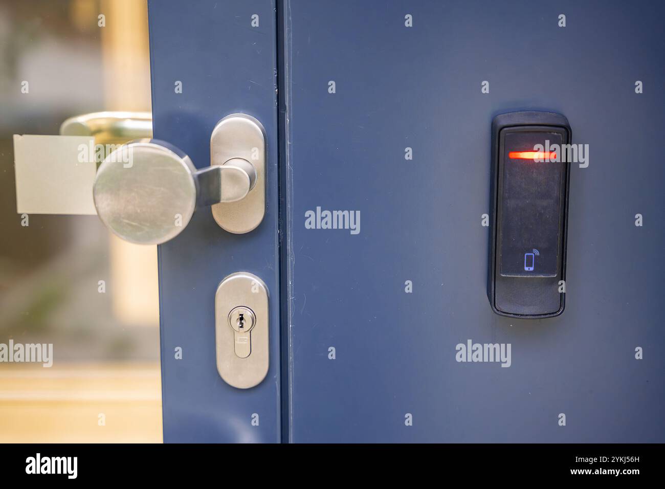 Close up view of door with electric lock with reader of entry system ...