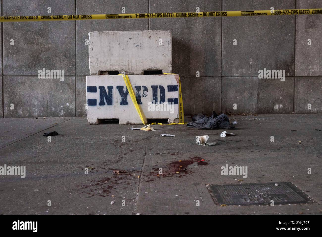Blood stains the ground at the site of a stabbing spree near the United ...