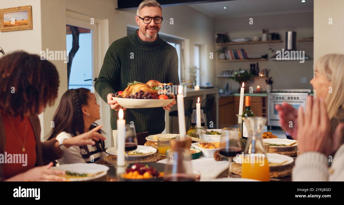 Happy family, serving chicken and thanksgiving dinner with children ...