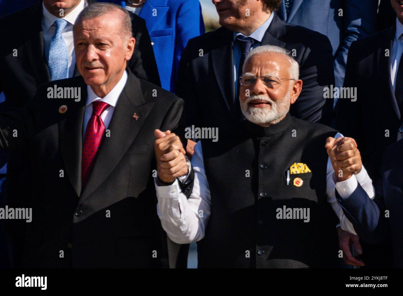 Turkey's President Recep Tayyip Erdogan, left, poses with Prime ...