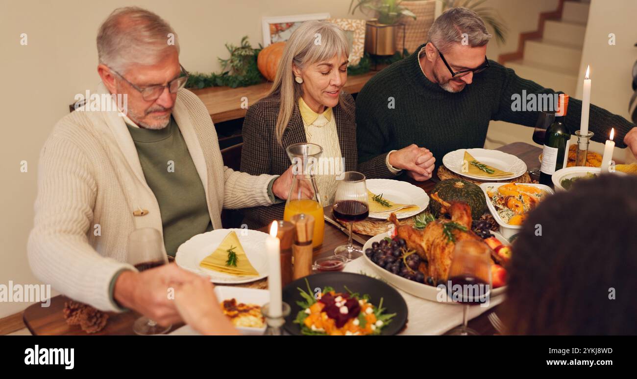 Thanksgiving, people and holding hands with prayer for food, festive ...