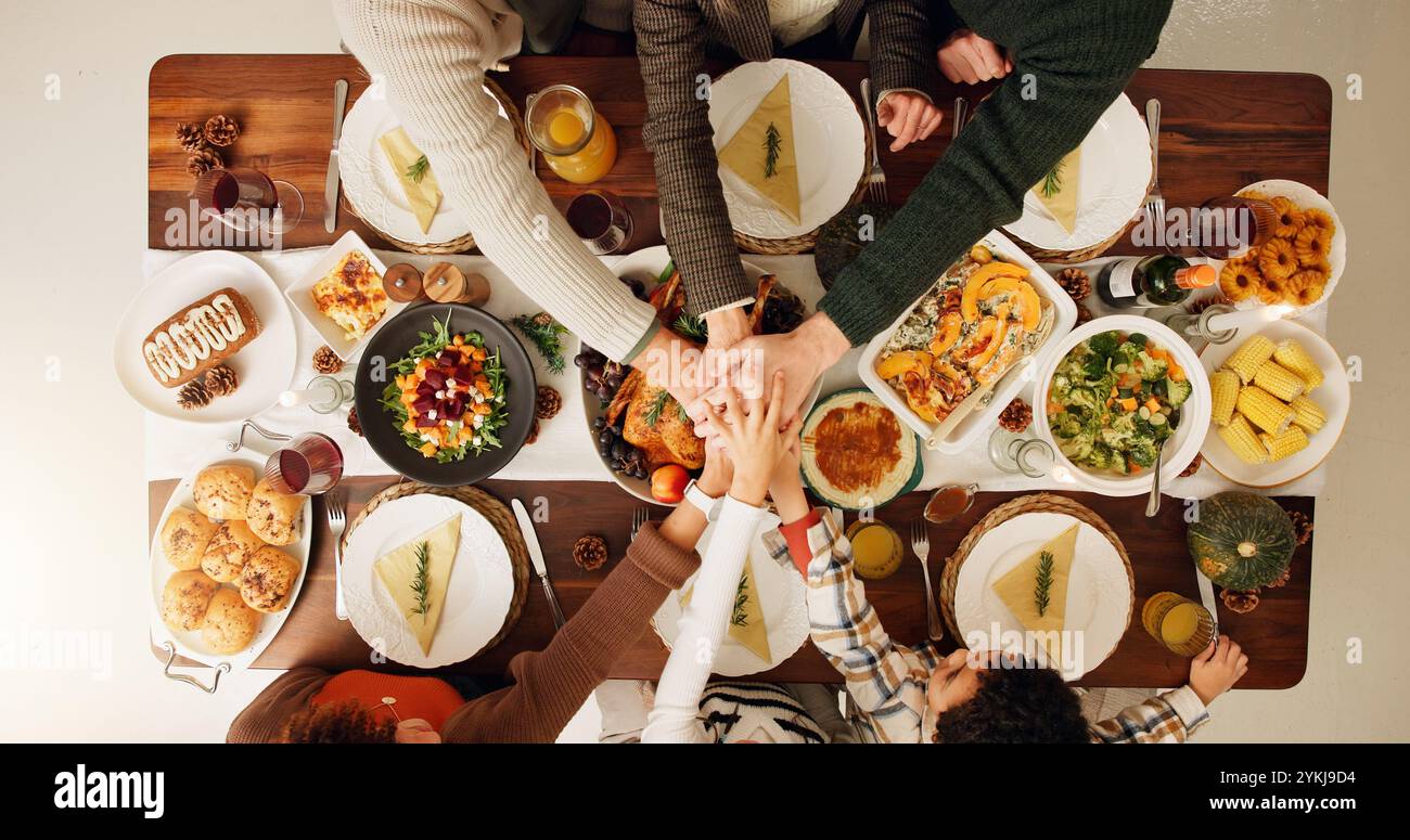 Above, hands together and thanksgiving with family and food for ...