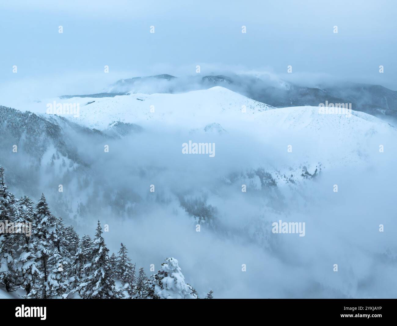 Mountains covered thick layer snow hi-res stock photography and images ...