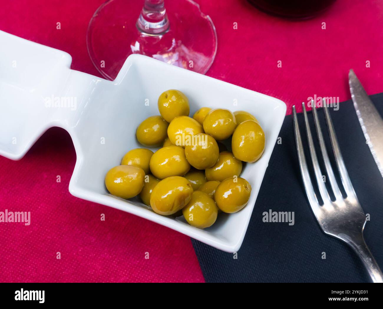 Pickled olives with a stone - a typical Spanish tapas Stock Photo - Alamy