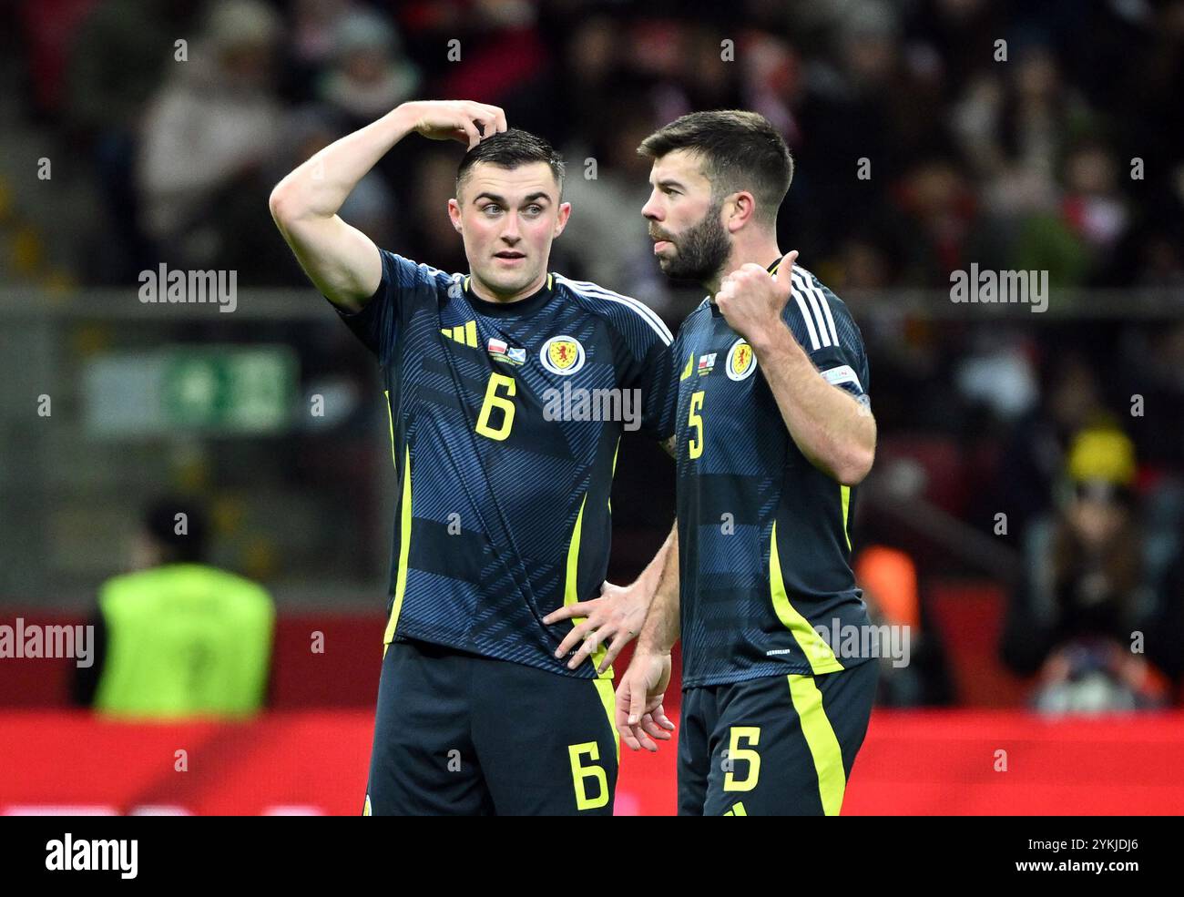 Scotland's John Souttar and Grant Hanley reacts after Poland's Kamil ...