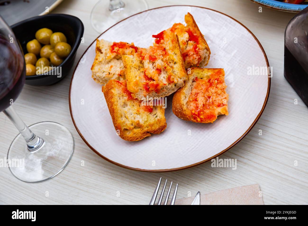 Traditional Spanish toasted bread with tomato with olive oil Stock ...