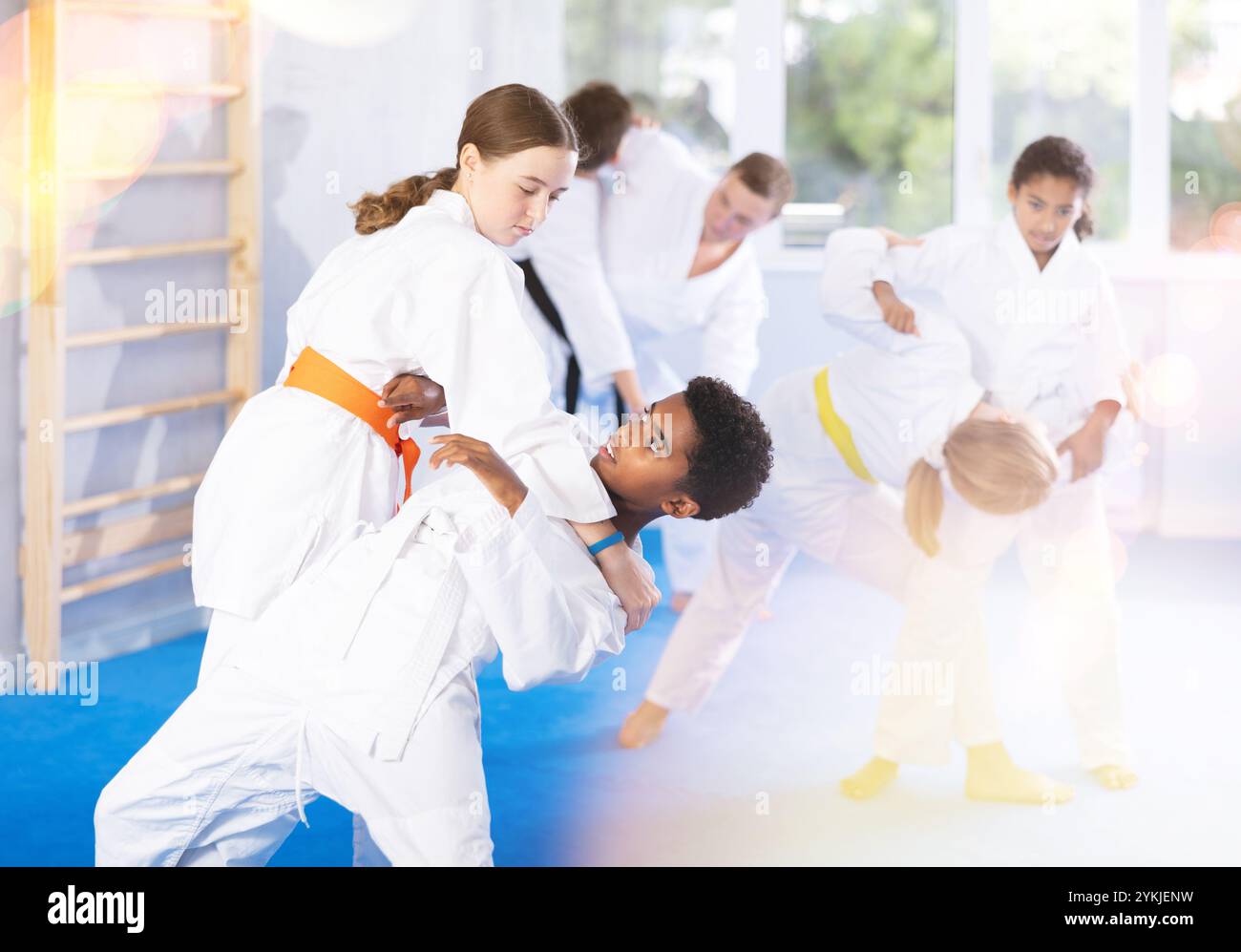 Sparring during karate training of children of different nationalities ...