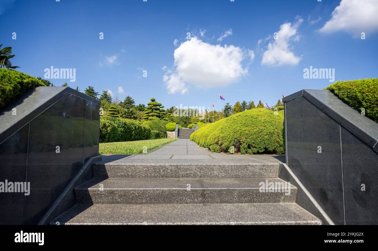 Walkway and steps through the UN Memorial Cemetery in Busan, Korea on 1 ...