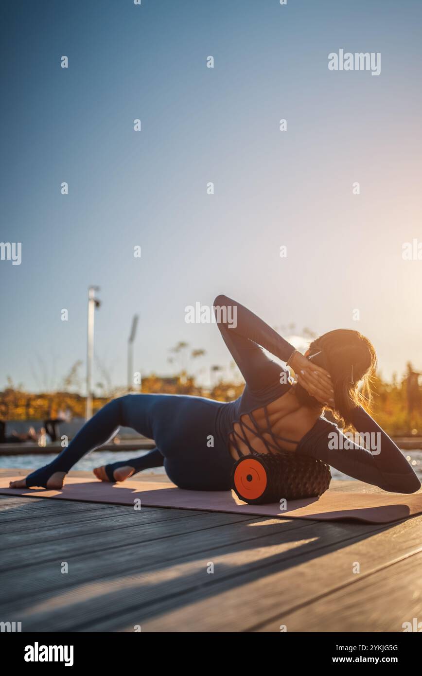 active fitness woman practicing muscular relaxation exercise with ...